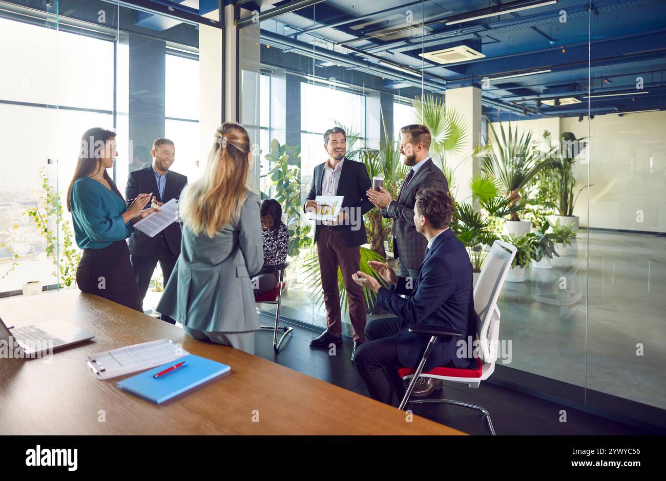 Young people group of company employees talking on business meeting ...
