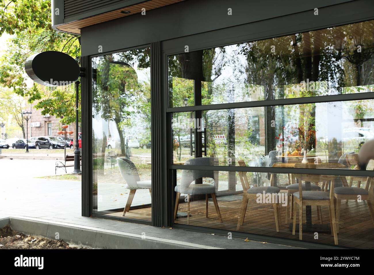Stylish cafe with large windows, view from outdoors Stock Photo - Alamy