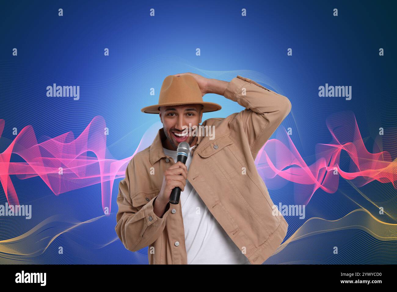 Handsome man with microphone singing on blue gradient background. Sound ...