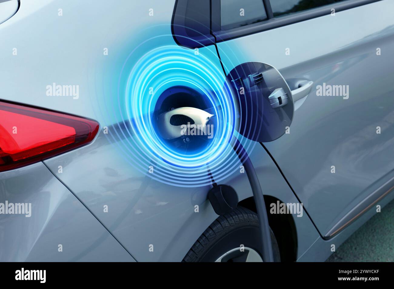 Charging modern electric car from station outdoors. Round pulse waves ...