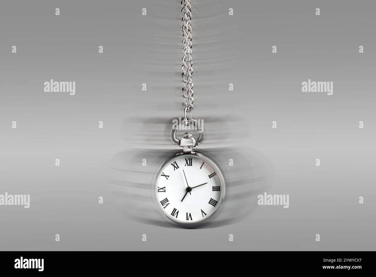 Hypnosis session. Vintage pocket watch swinging on grey background ...