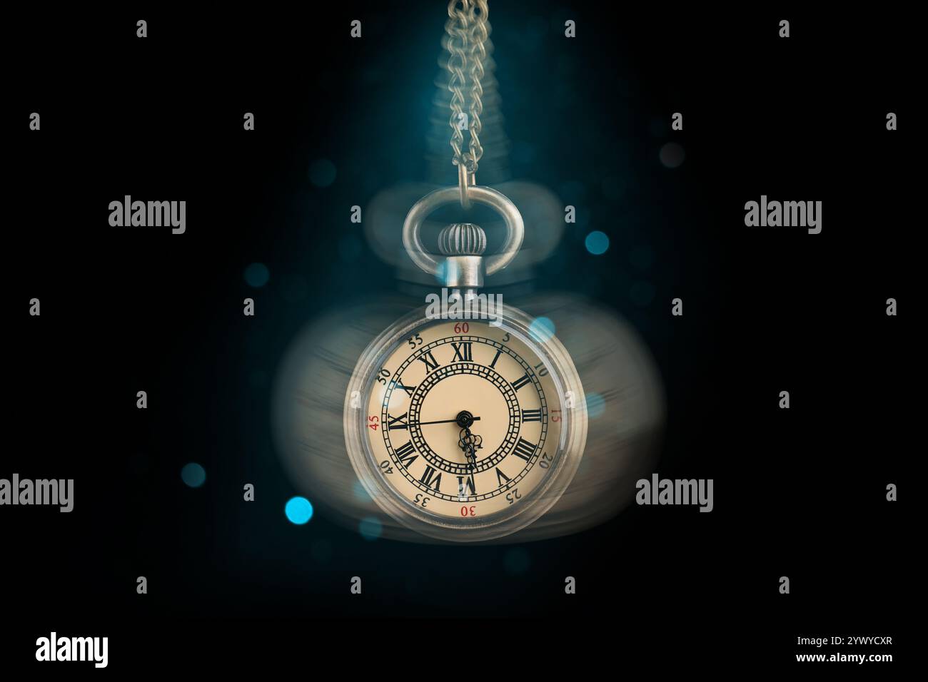 Hypnosis session. Vintage pocket watch swinging on black background ...