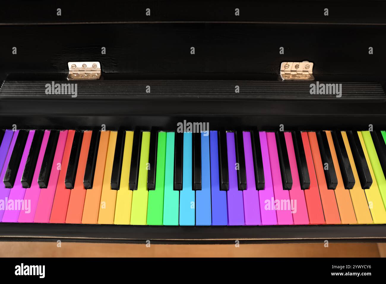 Piano with keys in colors of rainbow, closeup. Musical instrument Stock ...