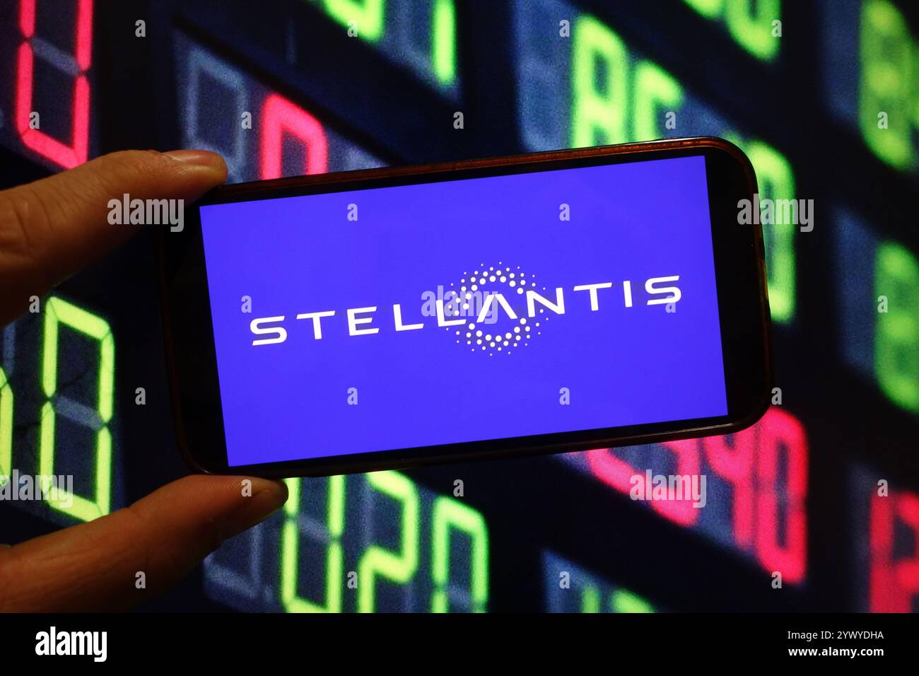 In this photo illustration, the Stellantis company logo is seen ...