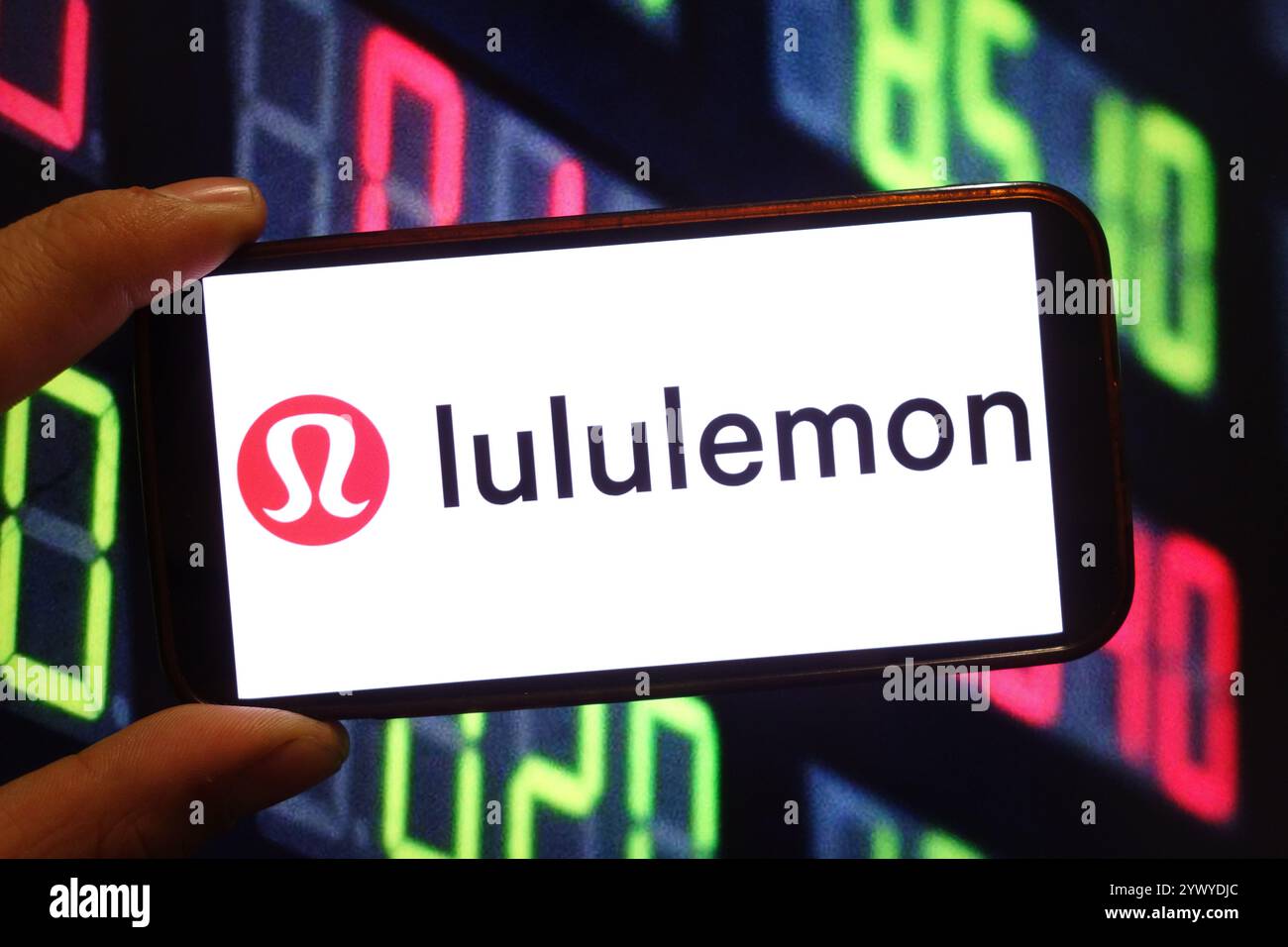 In this photo illustration, the Lululemon Athletica company logo is ...