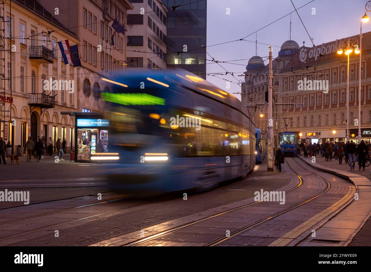 Fast electric tram passing on a city street in zagreb, Croatia Stock ...