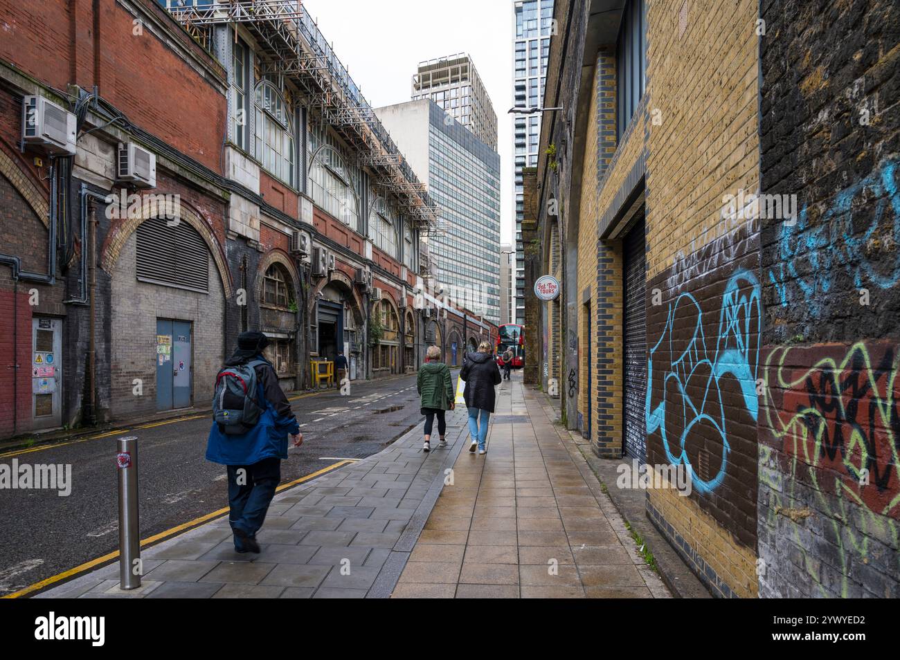 People walk along Mepham Street a scruffy run down backstreet Waterloo ...