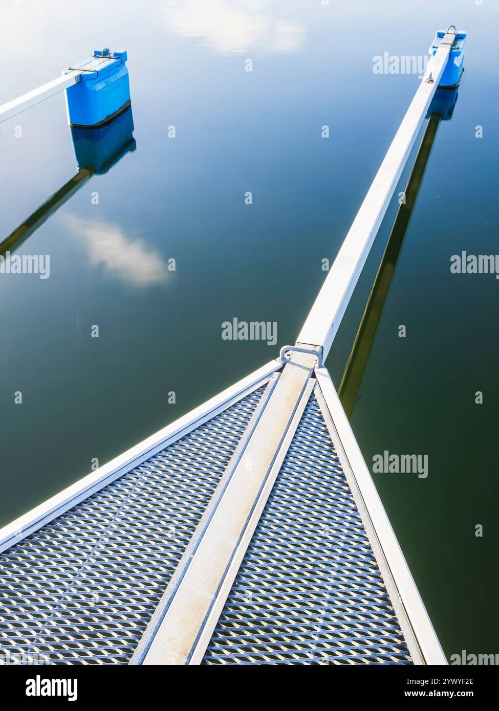 A modern docking system features metallic structures extending into ...