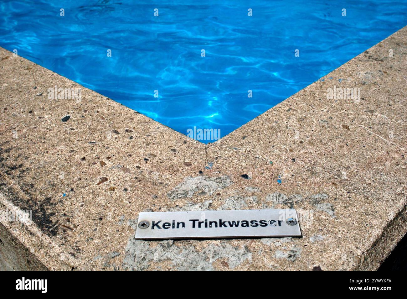 Sign with warning - No Drinking Water - in German lettering on a public ...