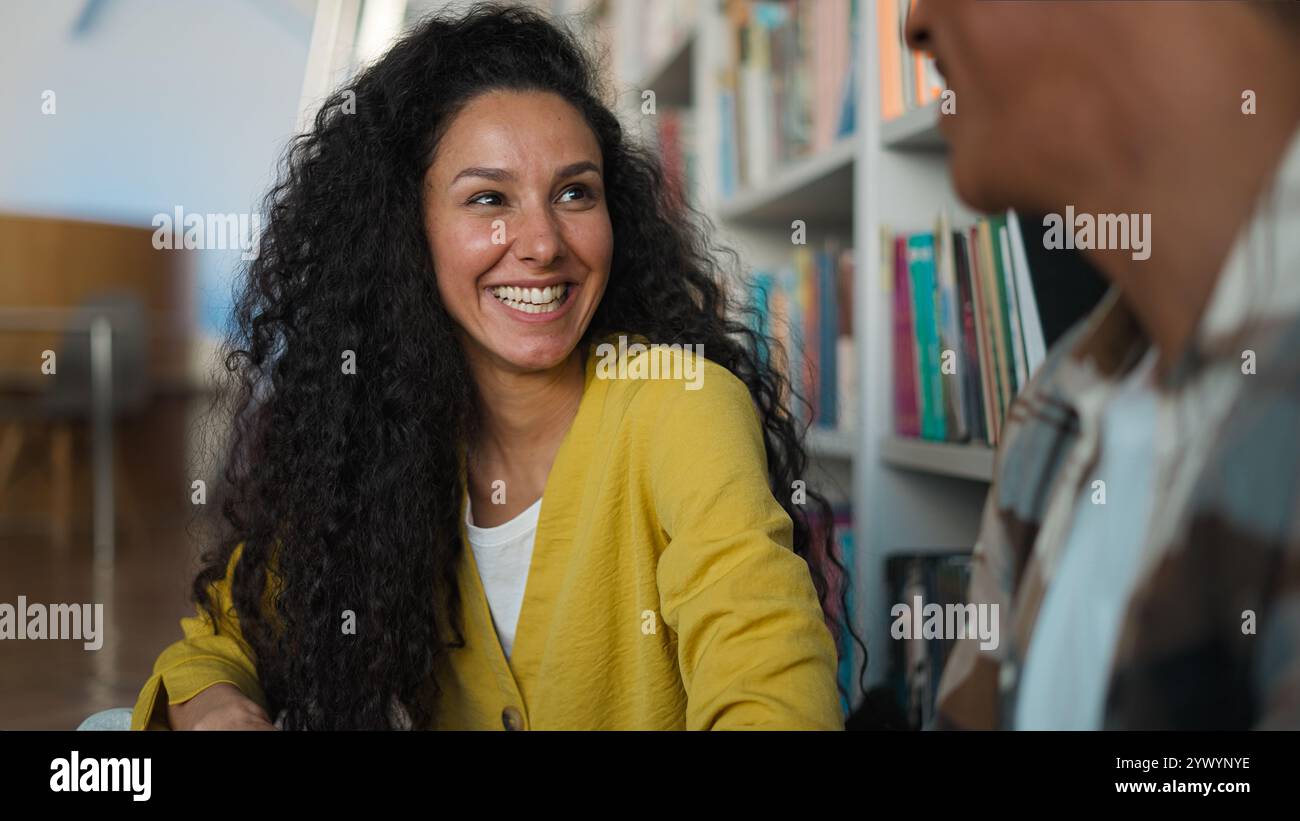 Indian Arabian Latina woman African American man classmates friends ...