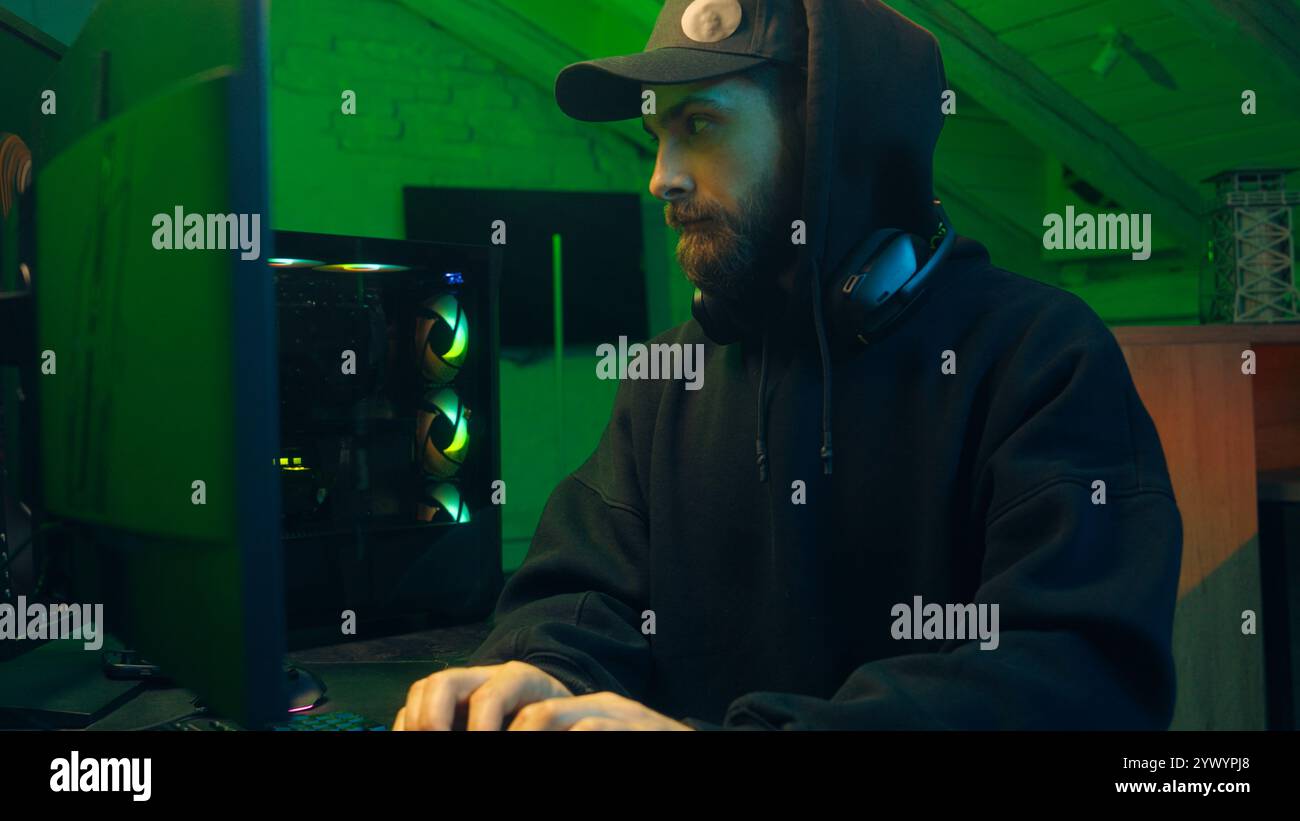 Caucasian man typing keyboard computer desktop pc online cyber crime virtual networks browser ...