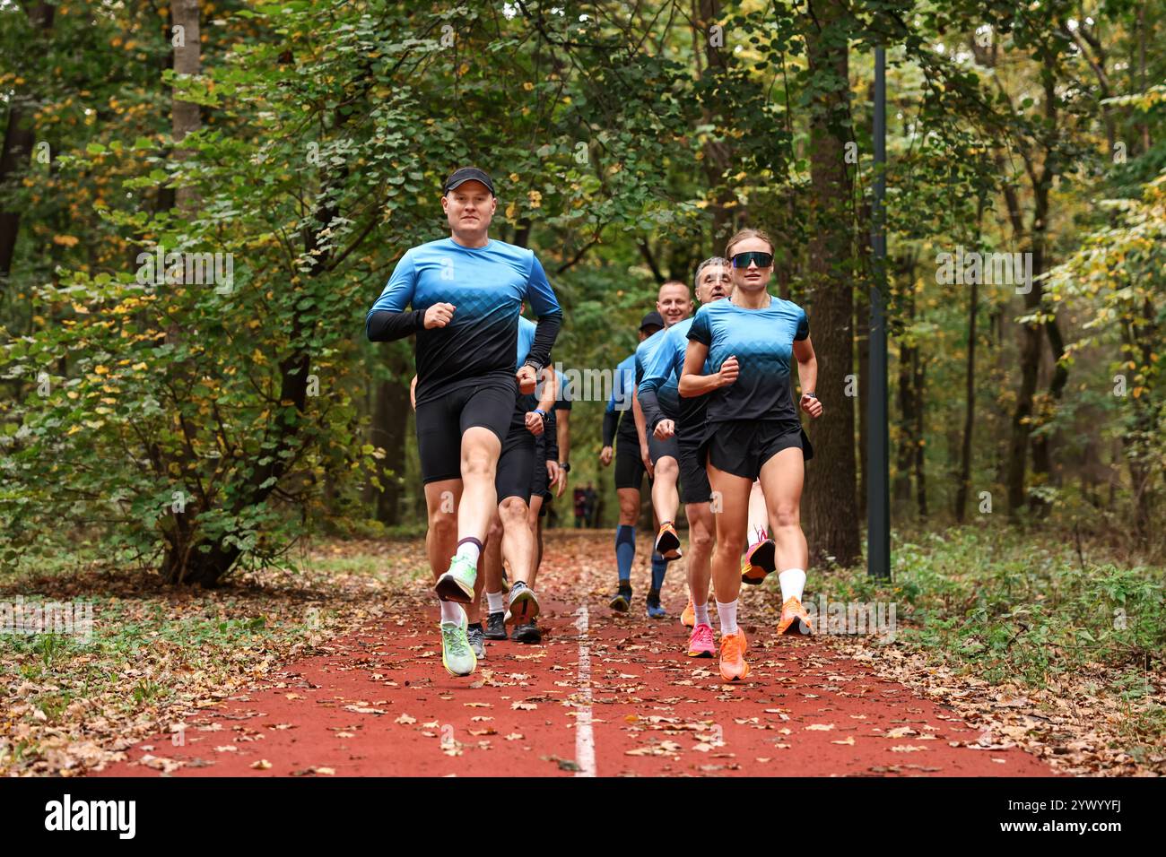 Athletic group people running park hi-res stock photography and images - Alamy