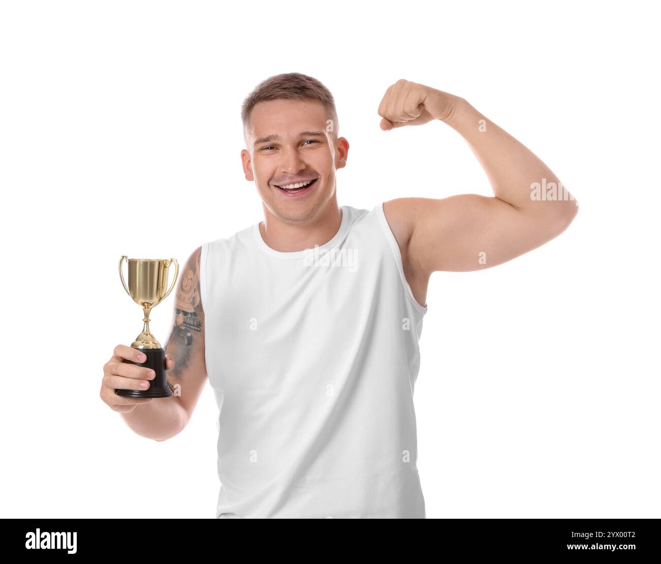 Happy winner with golden trophy cup showing his bicep on white ...