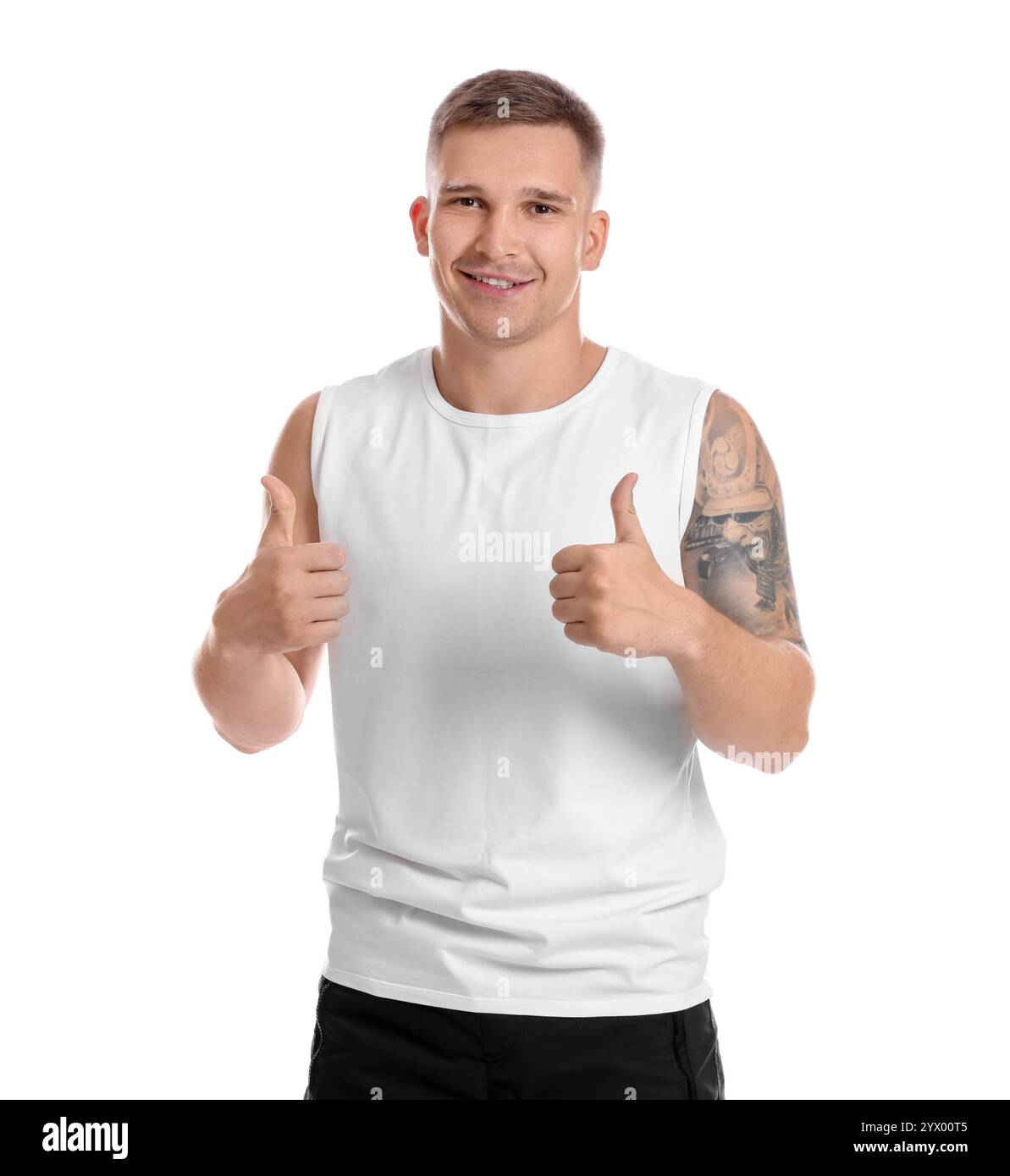 Happy winner showing thumbs up on white background Stock Photo - Alamy