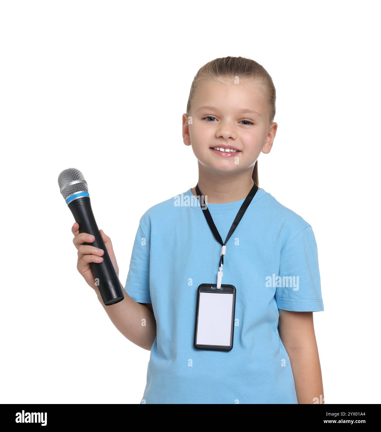 Little girl with microphone pretending to be journalist on white ...