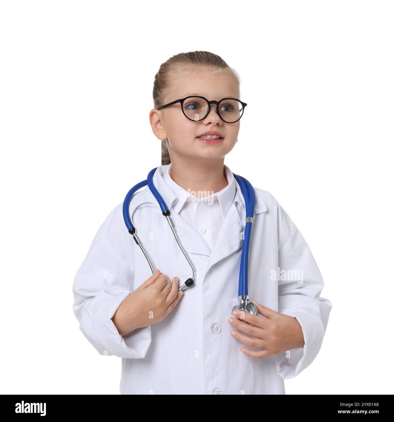 Little girl with stethoscope pretending to be doctor on white ...