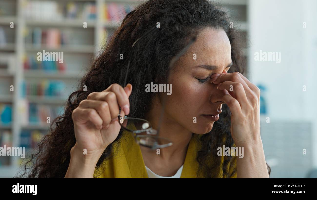 Tired Arabian Latino woman glasses rubbing eyes female exhausted ...