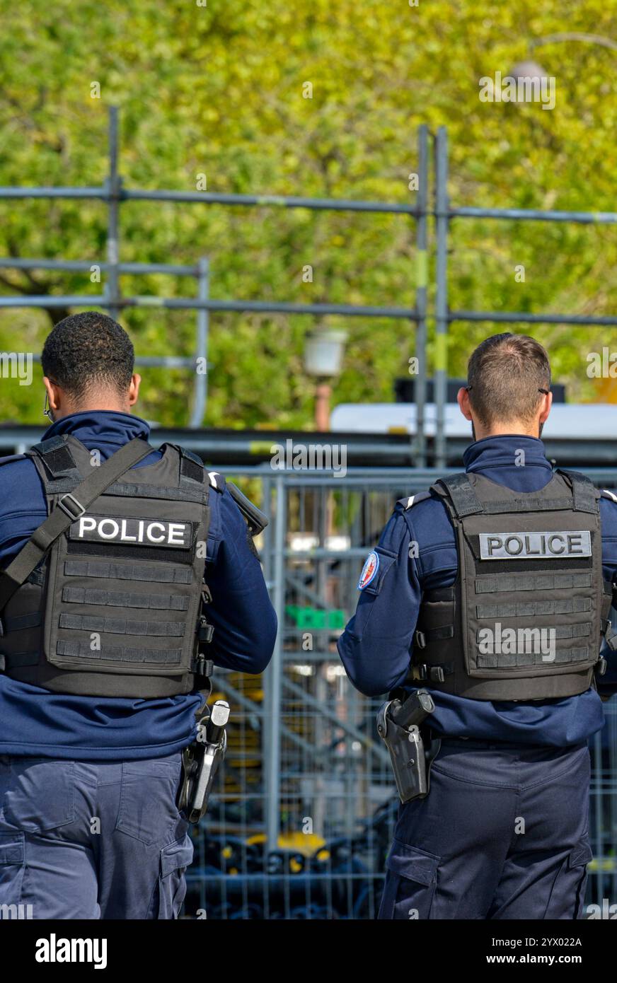 French Police officers patrol the area around the Arc de Triumphe in ...