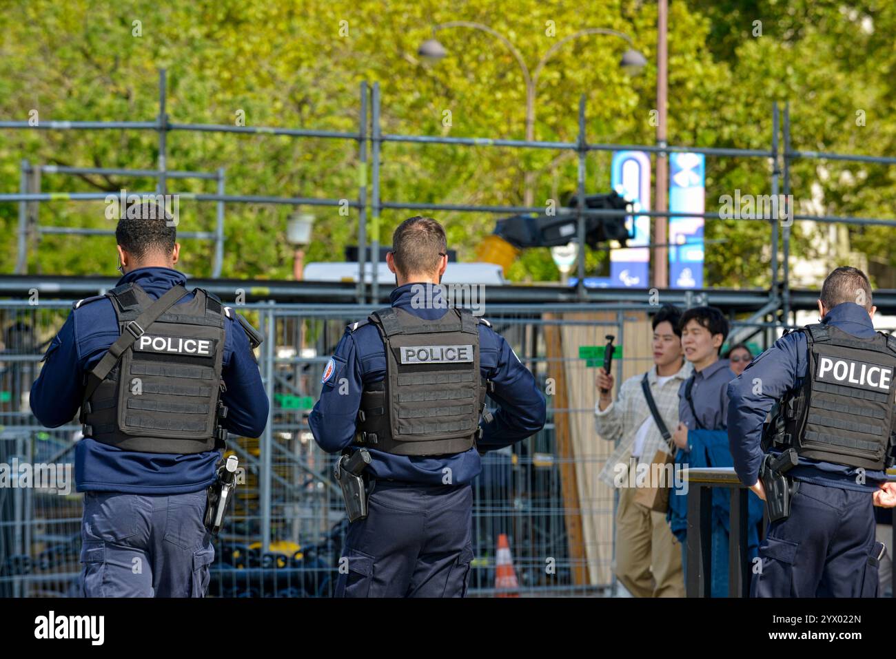 French Police officers patrol the area around the Arc de Triumphe in ...