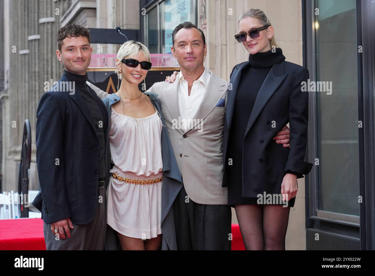 Raff Law, from left, Iris Law, Jude Law, and Phillipa Coan pose with ...