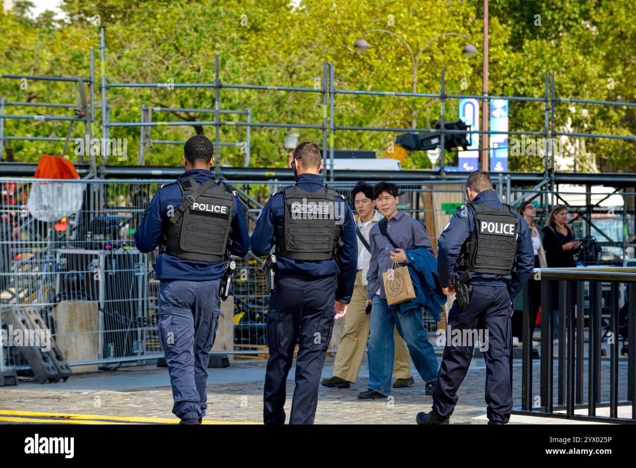 French Police officers patrol the area around the Arc de Triumphe in ...