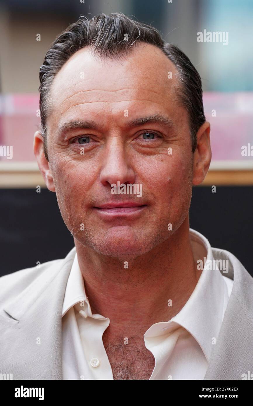 Jude Law attends a ceremony honoring him with a star on the Hollywood ...
