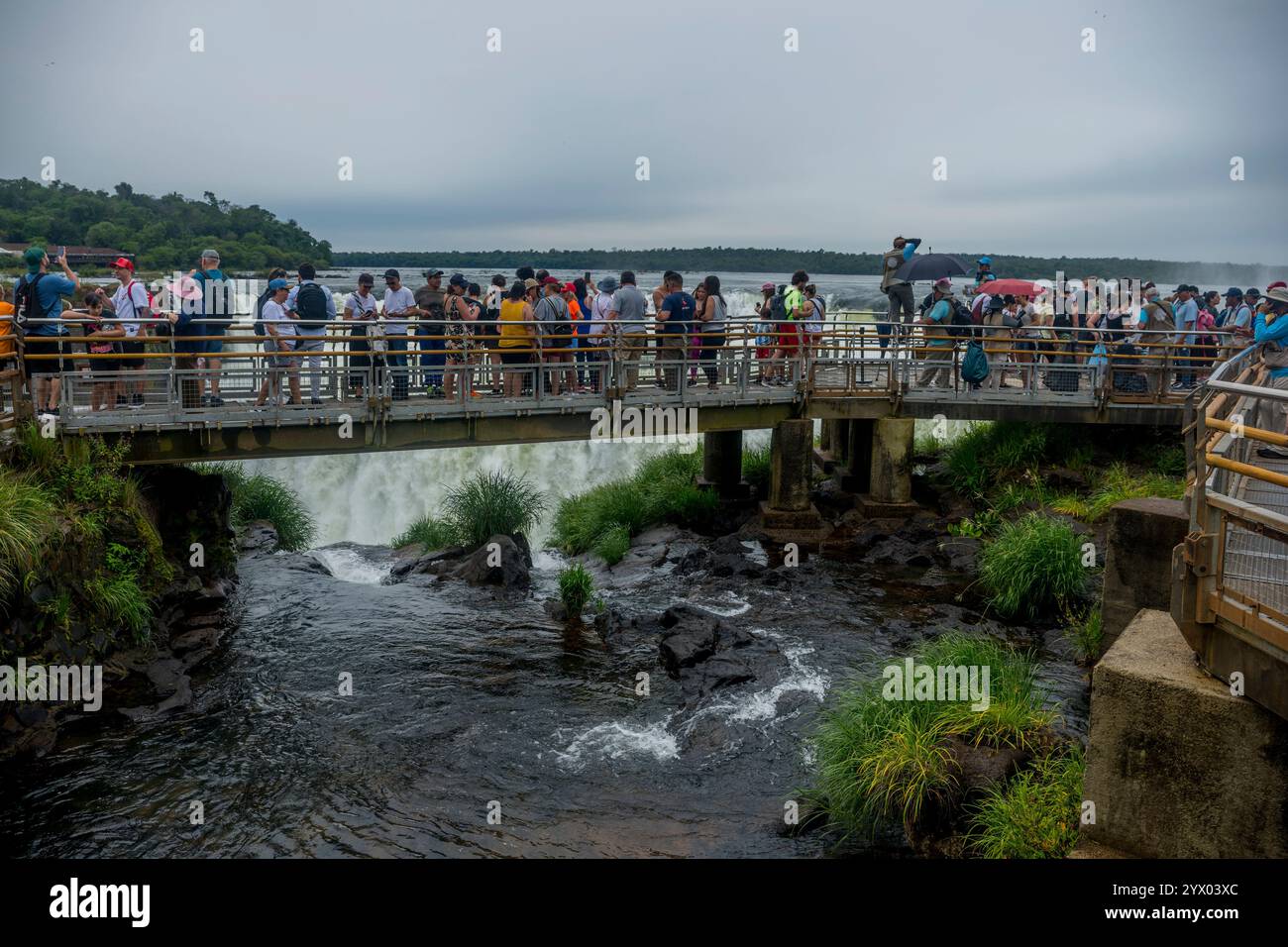 People on the viewing platform at Devil s Throat Waterfall in Iguazu ...
