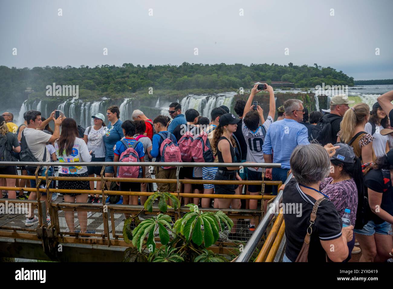People on the viewing platform at Devil s Throat Waterfall in Iguazu ...