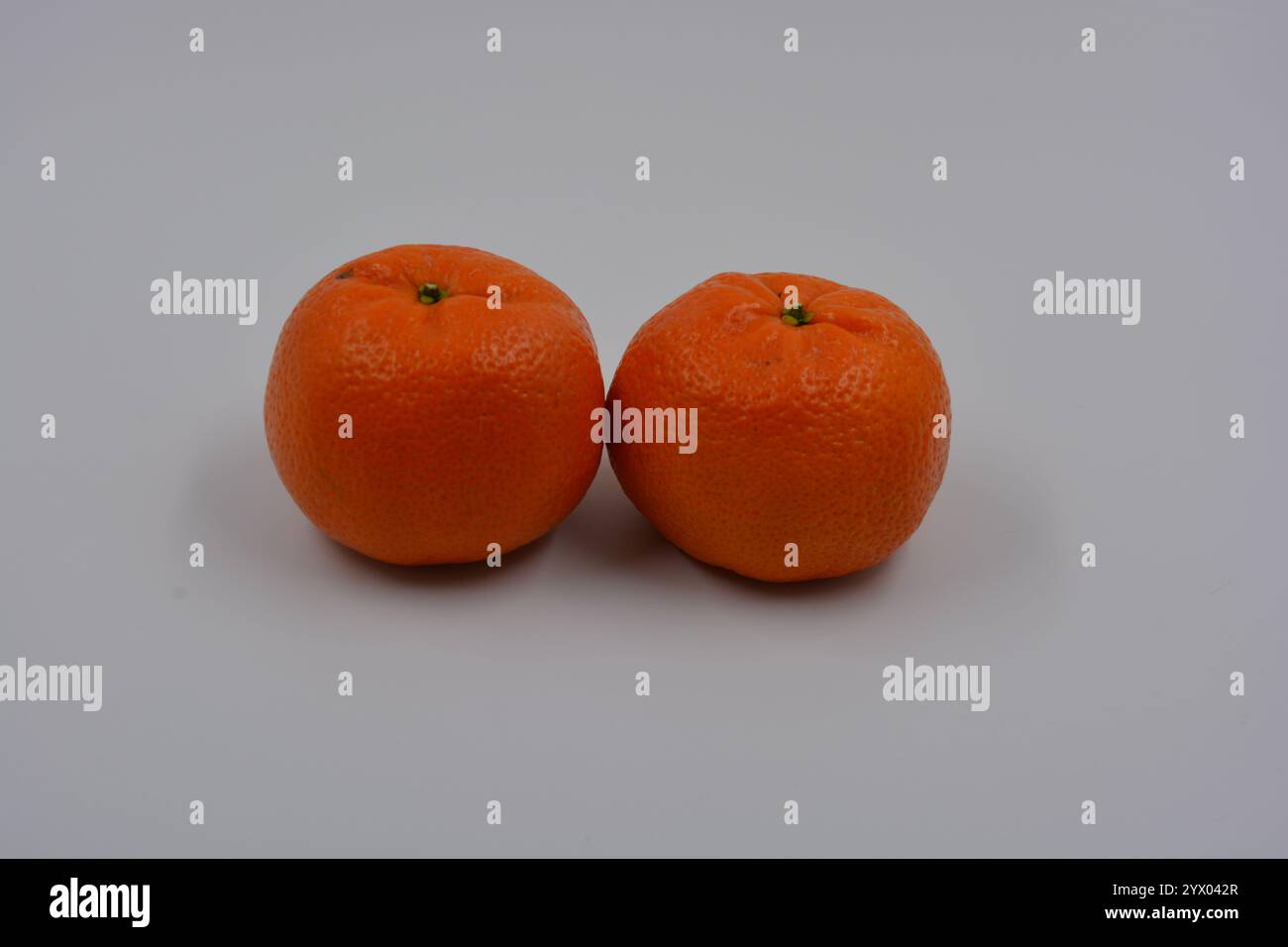 Healthy, wholesome food, fruits and vegetables. Two whole orange ...
