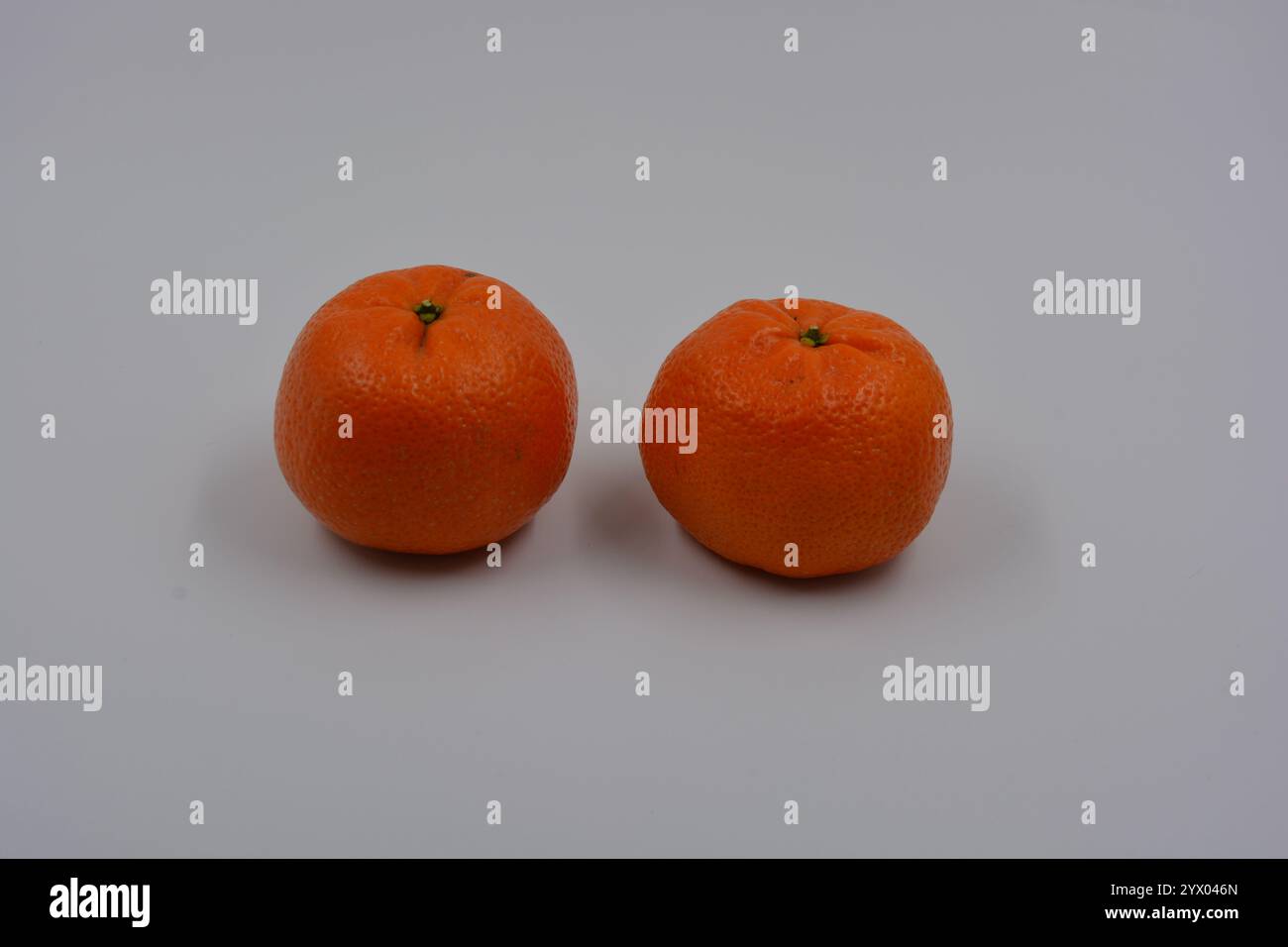 Healthy, wholesome food, fruits and vegetables. Two whole orange ...