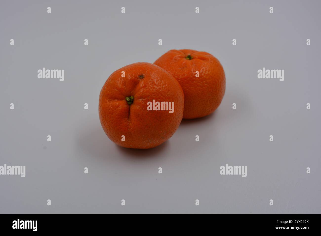 Healthy, wholesome food, fruits and vegetables. Two whole orange ...