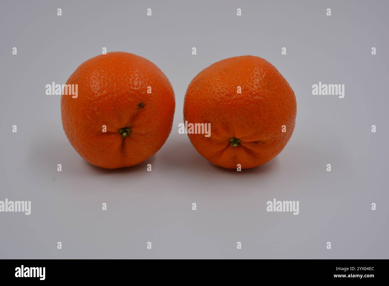Healthy, wholesome food, fruits and vegetables. Two whole orange ...