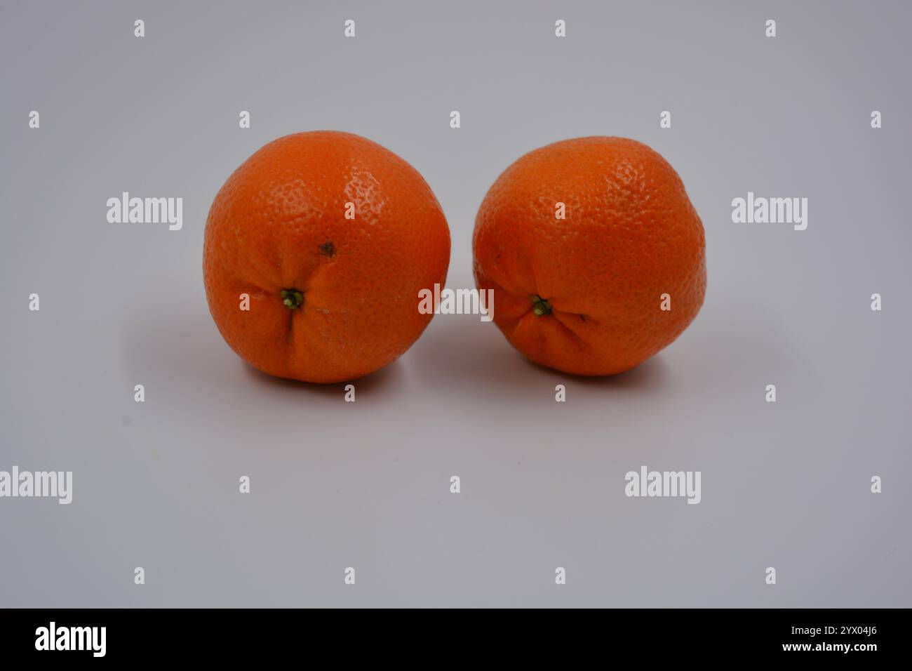 Healthy, wholesome food, fruits and vegetables. Two whole orange ...