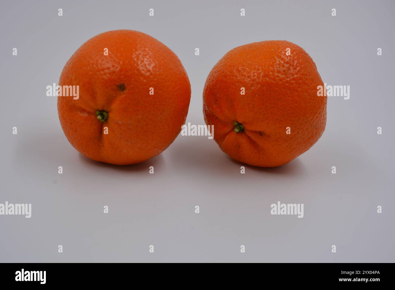 Healthy, wholesome food, fruits and vegetables. Two whole orange ...