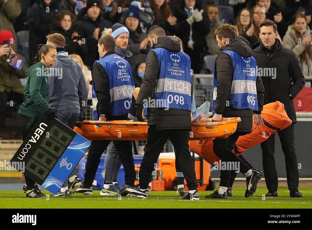 Manchester City's Alex Greenwood leaves the pitch on a stretcher after going down injured during ...