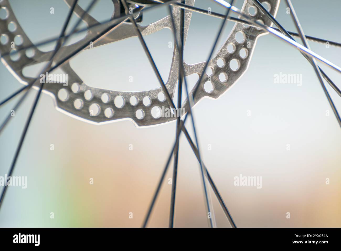 partial view of the spokes of the front wheel of a professional racing ...
