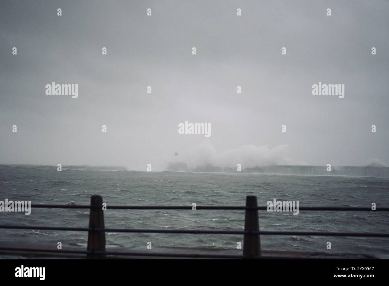 newhaven harbour arm sea wall on a stormy day Stock Photo - Alamy