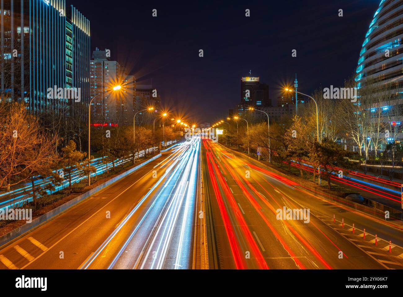 Urban Night Scene with Motion Blur of Traffic Lights Stock Photo - Alamy