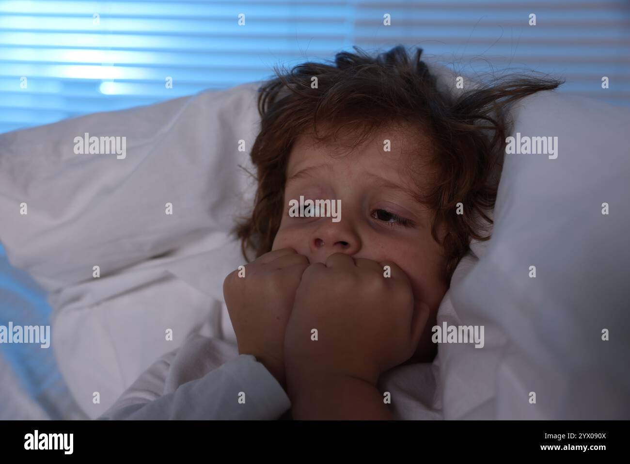 Scared boy hi-res stock photography and images - Alamy