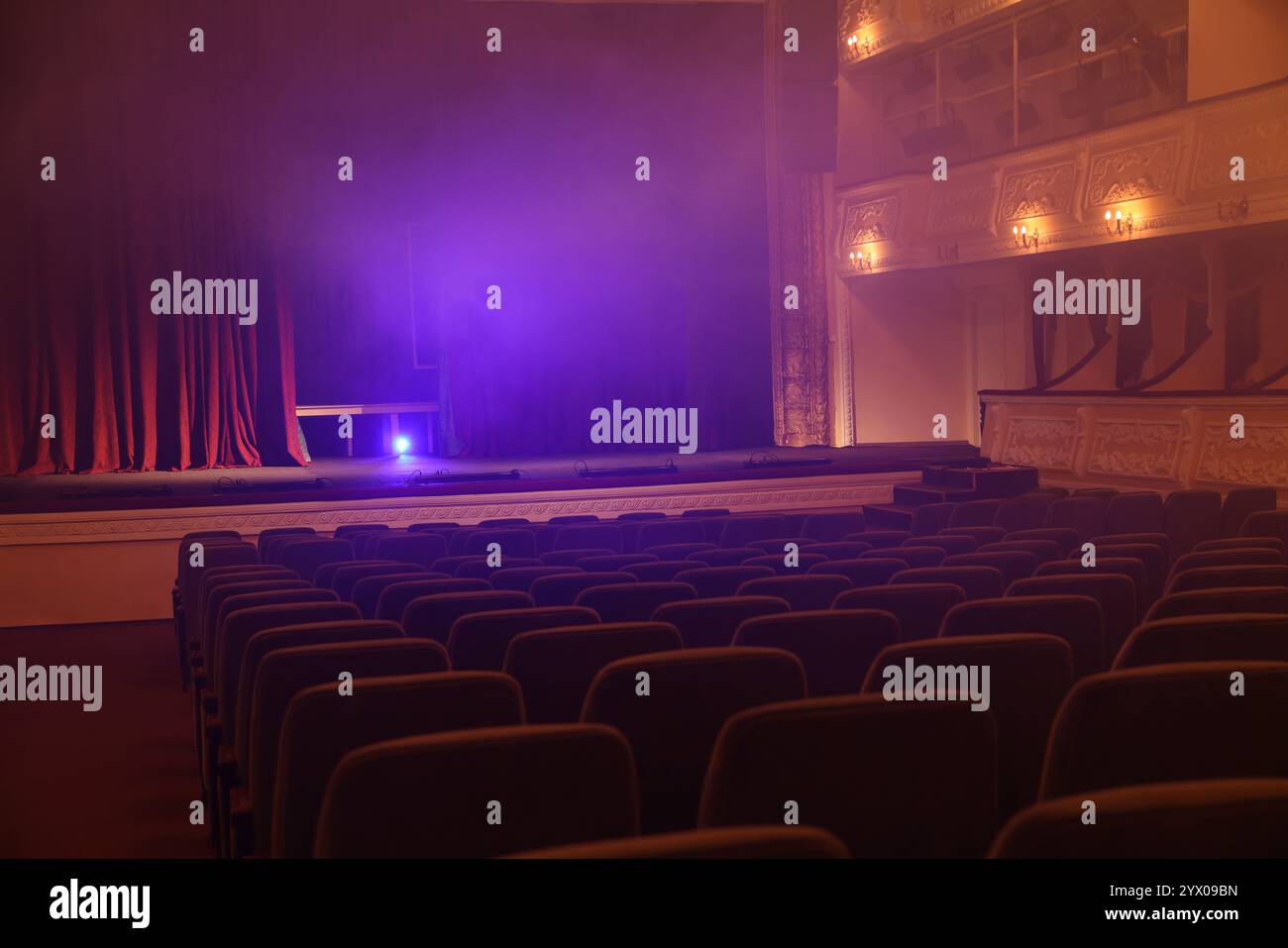 Professional spotlight and smoke on stage in theatre Stock Photo - Alamy
