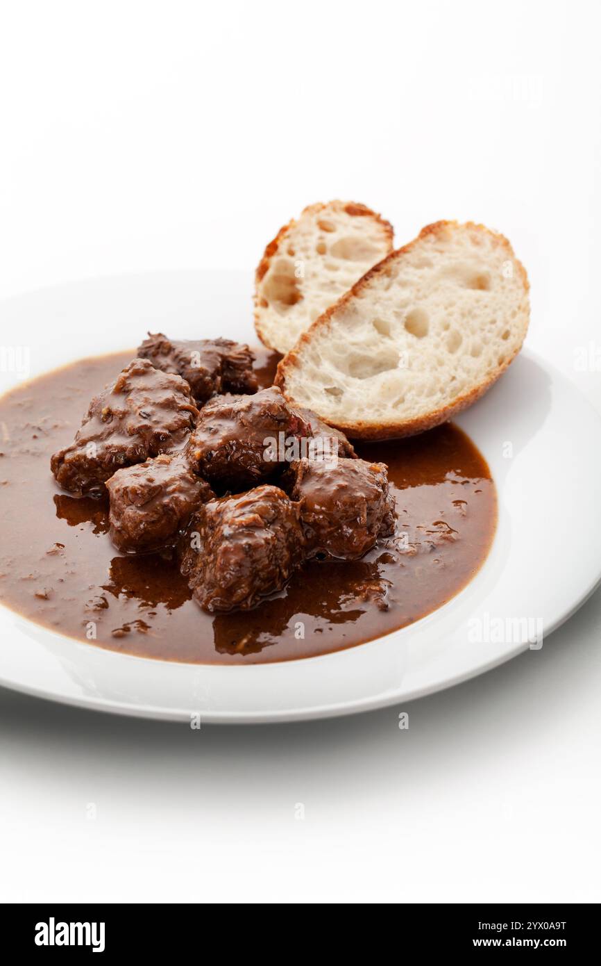 beef goulash with pastries, goulash with bread Stock Photo - Alamy