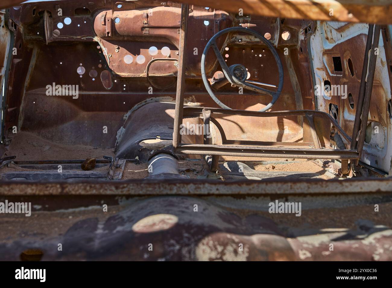 Inside view of an oldtimer, rusty, demolished and wrecked cars in ...