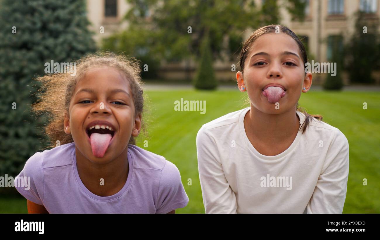 Funny happy girls two little children kids female friends pupils school ...