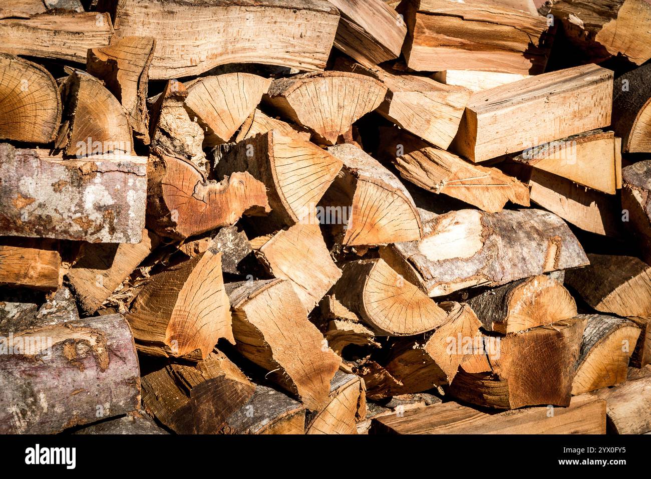 Raw timber material stacked up and ready to be used Stock Photo - Alamy