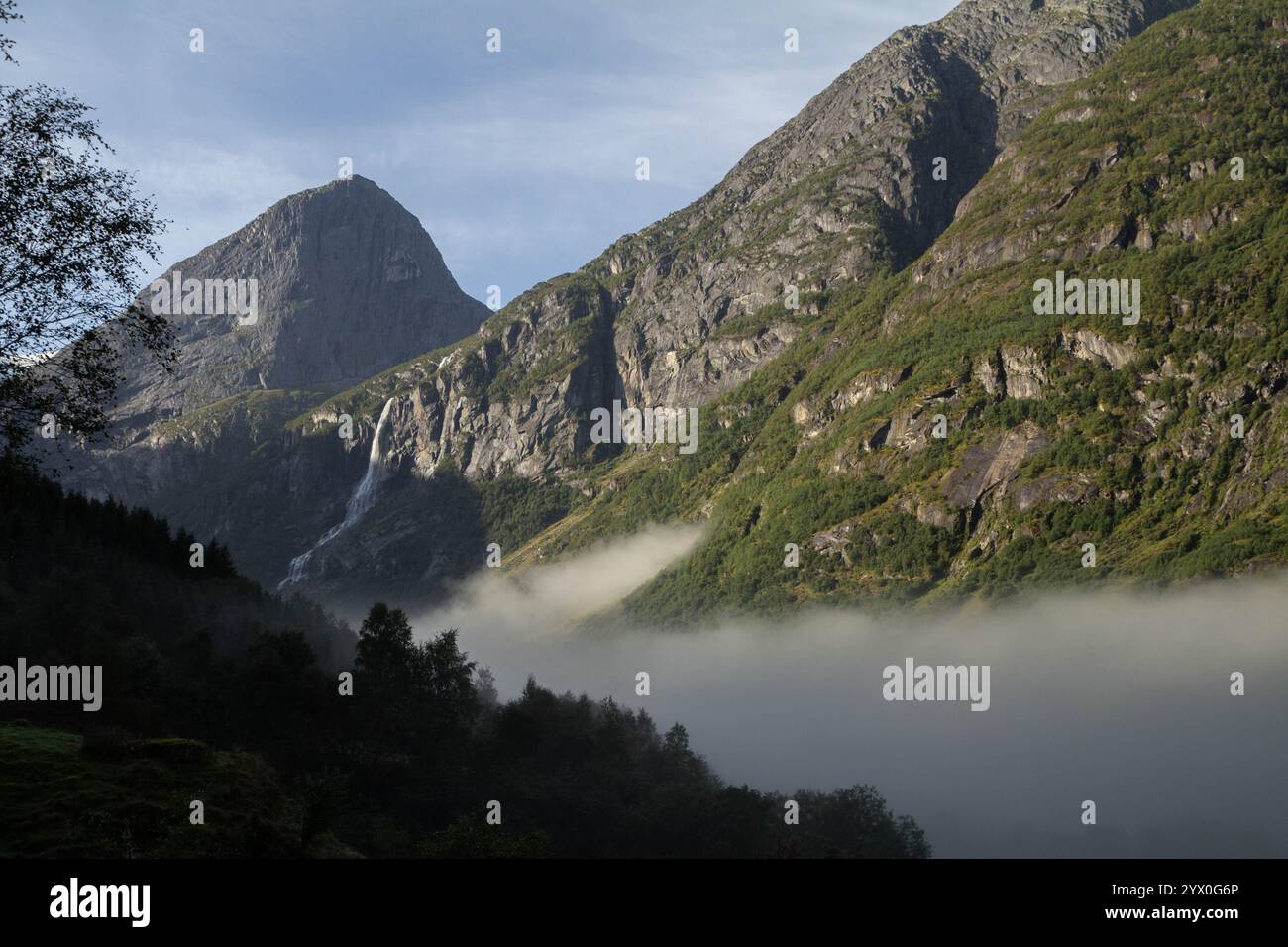 The mountains rise majestically in September, their green slopes and ...