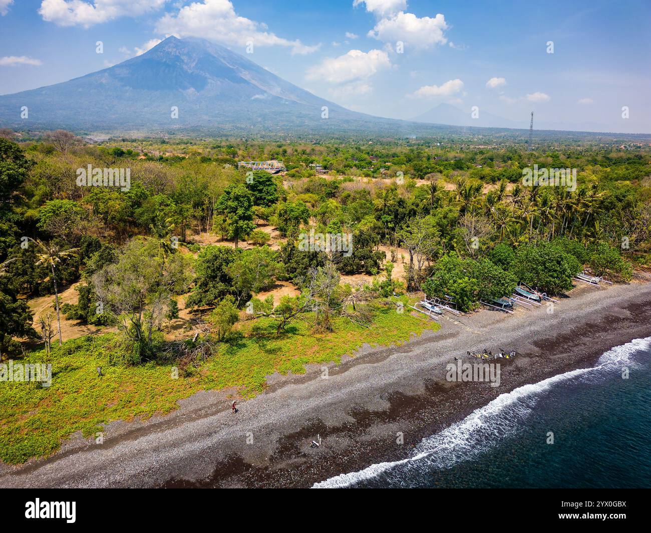 SCUBA diving equipment lying on the beach at Tulamben, Bali with ...