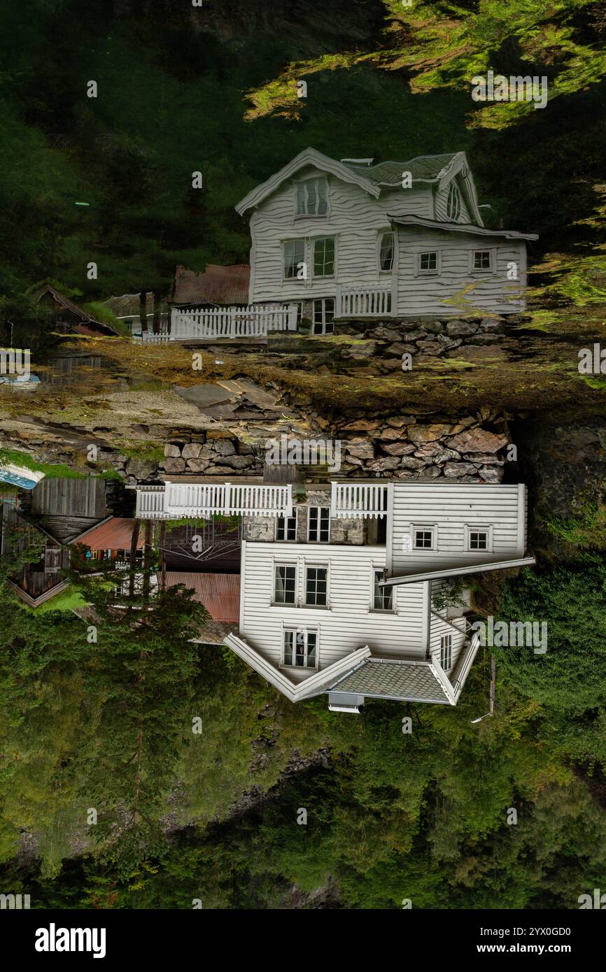 A beautiful house in Norway with a stunning reflection in the tranquil ...