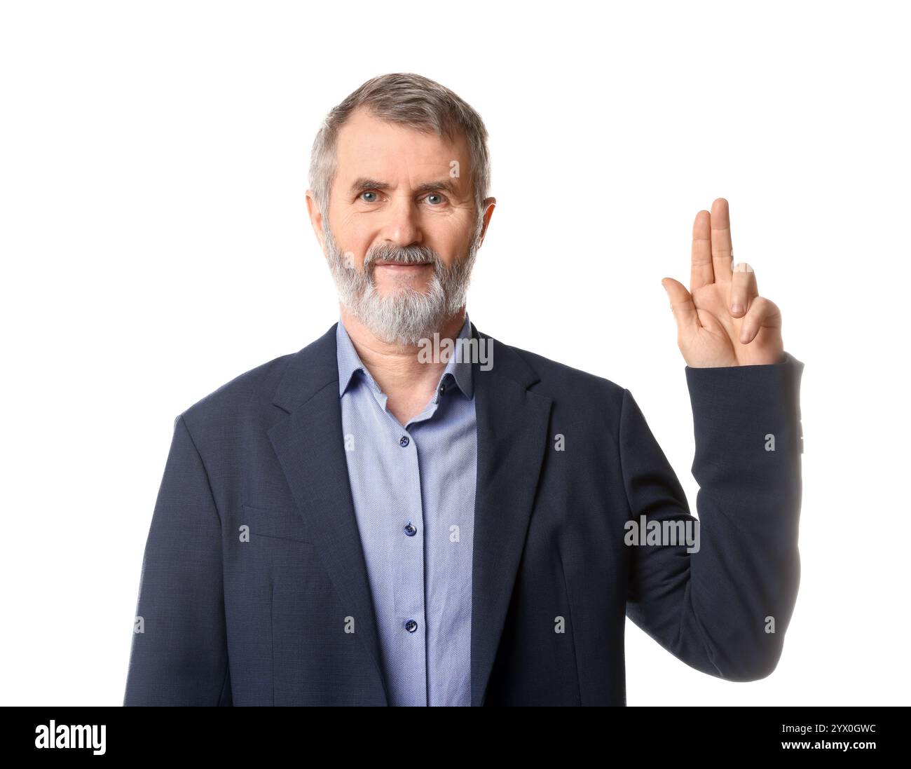 Mature man making promise on white background. Oath gesture Stock Photo ...