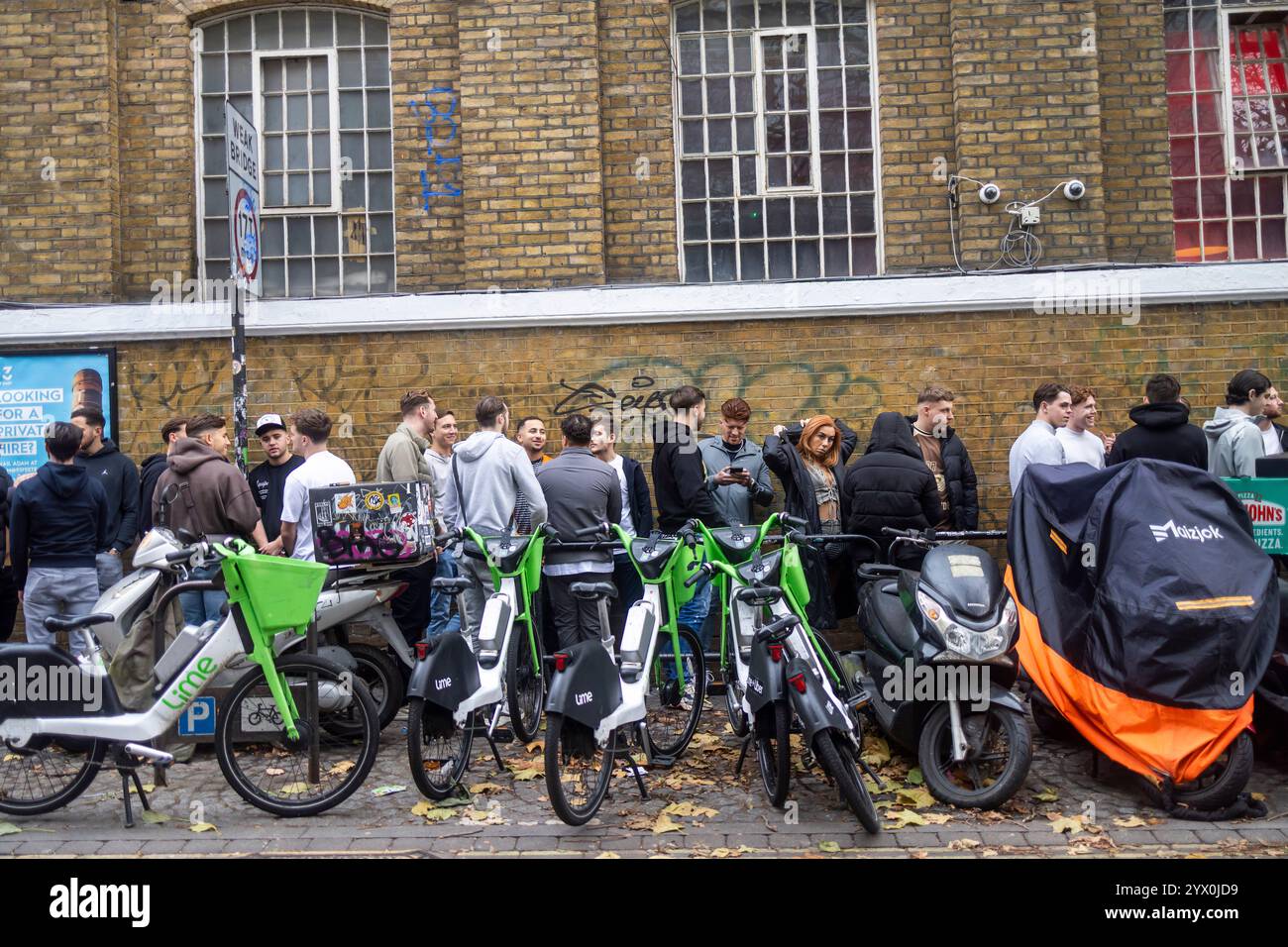 London, UK, December 1, 2024, A queue of young people outside a club on ...