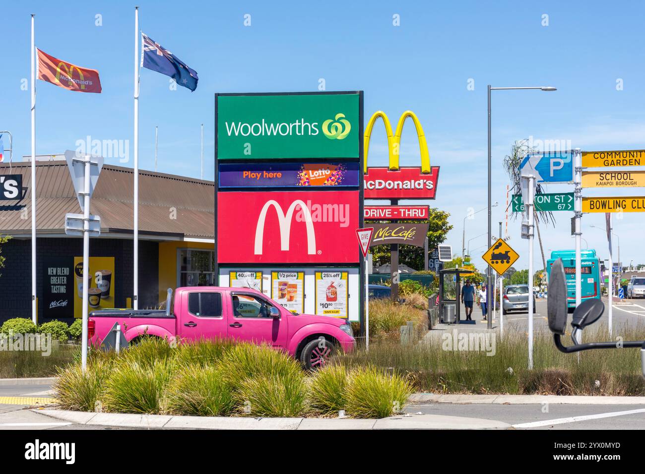 Mcdonalds restaurant and woolworths supermarket signs flags rou hi-res ...